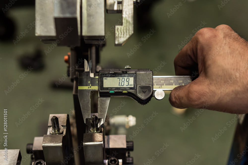 Vernier caliper measure diameter of locate pin in jig fixture structure ...