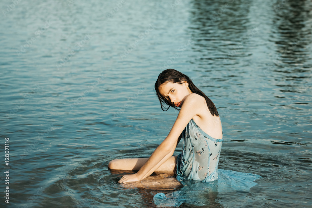 Pretty girl in water Stock Photo | Adobe Stock