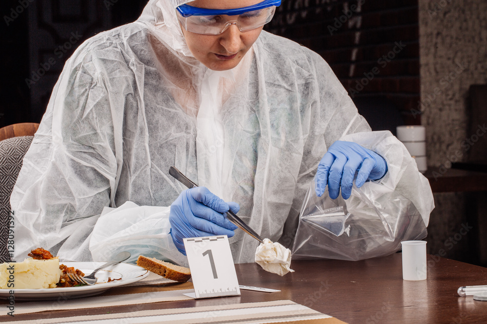 Crime scene investigation. collecting evidence from the crime scene ...