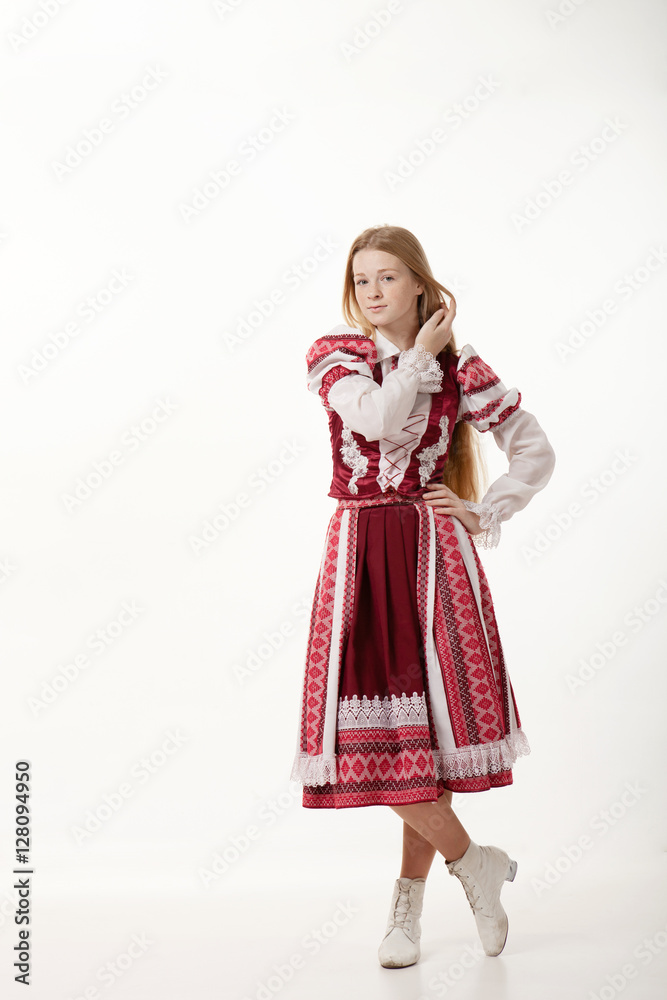 Young beautiful redhead folk dancer woman with gorgeous long hair in ...
