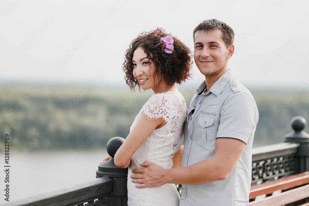happy smiling couple walking and hugging in the park Stock Photo ...