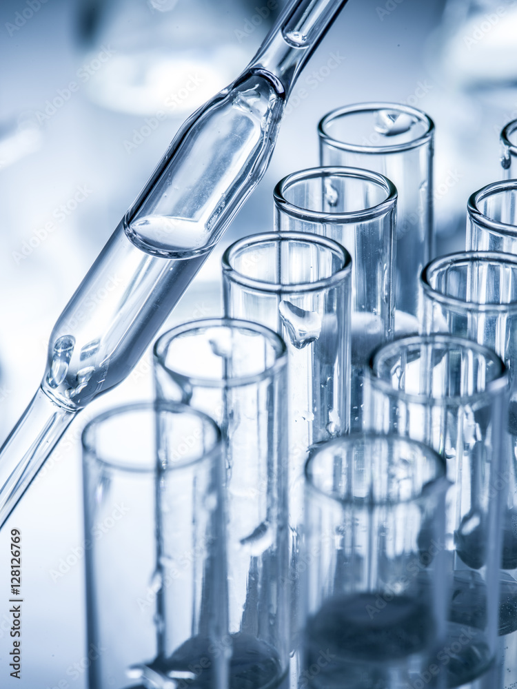 Different laboratory beakers and glassware. Stock Photo | Adobe Stock