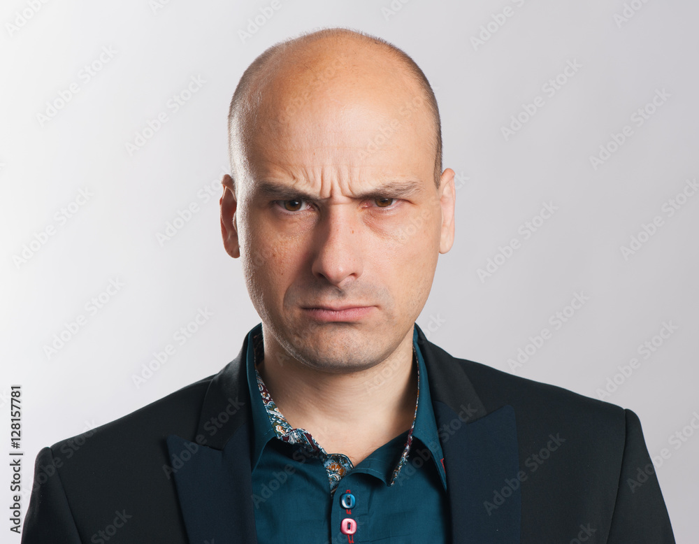 Angry bald dude expressive portrait Stock Photo | Adobe Stock
