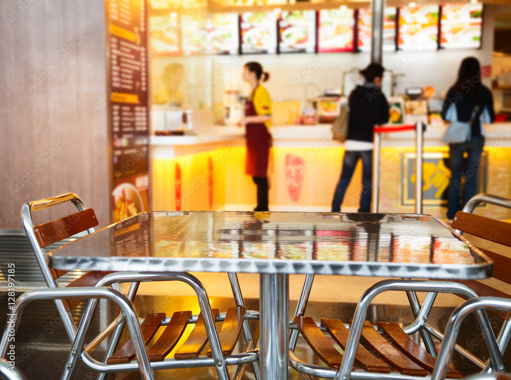 Foto de Seats and table at a fast food cafe do Stock | Adobe Stock
