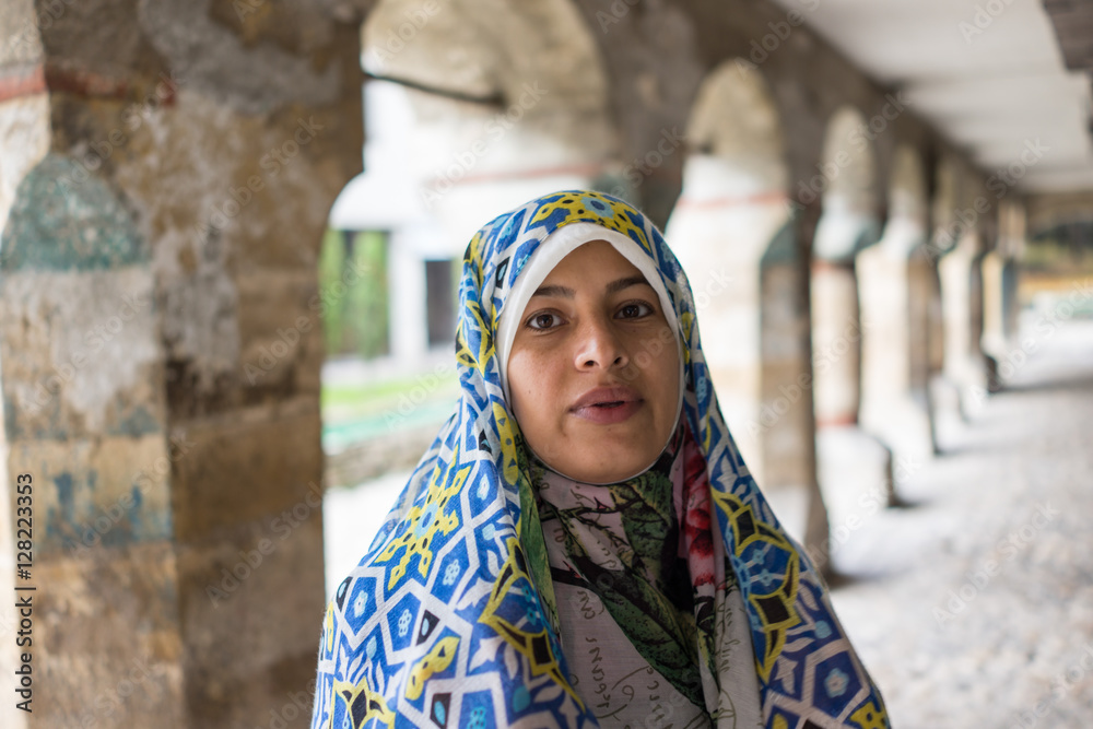 Muslim traditional woman visiting old historical city Stock Photo ...