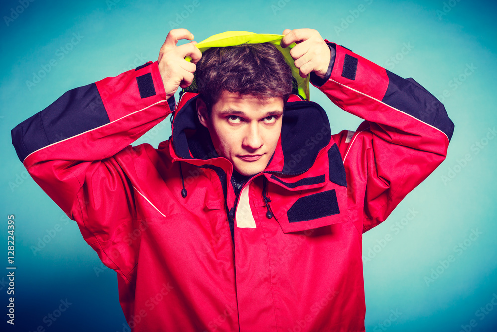 Young male getting dressed. foto de Stock | Adobe Stock