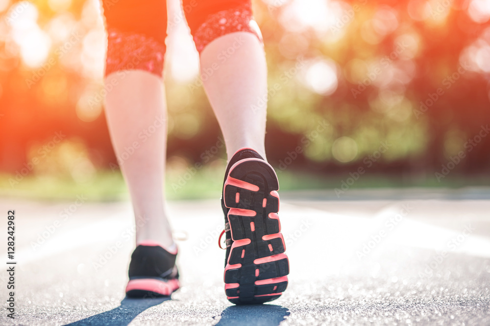 Young Girl Runner feet on track focus on sport shoe. Fitness Urban ...