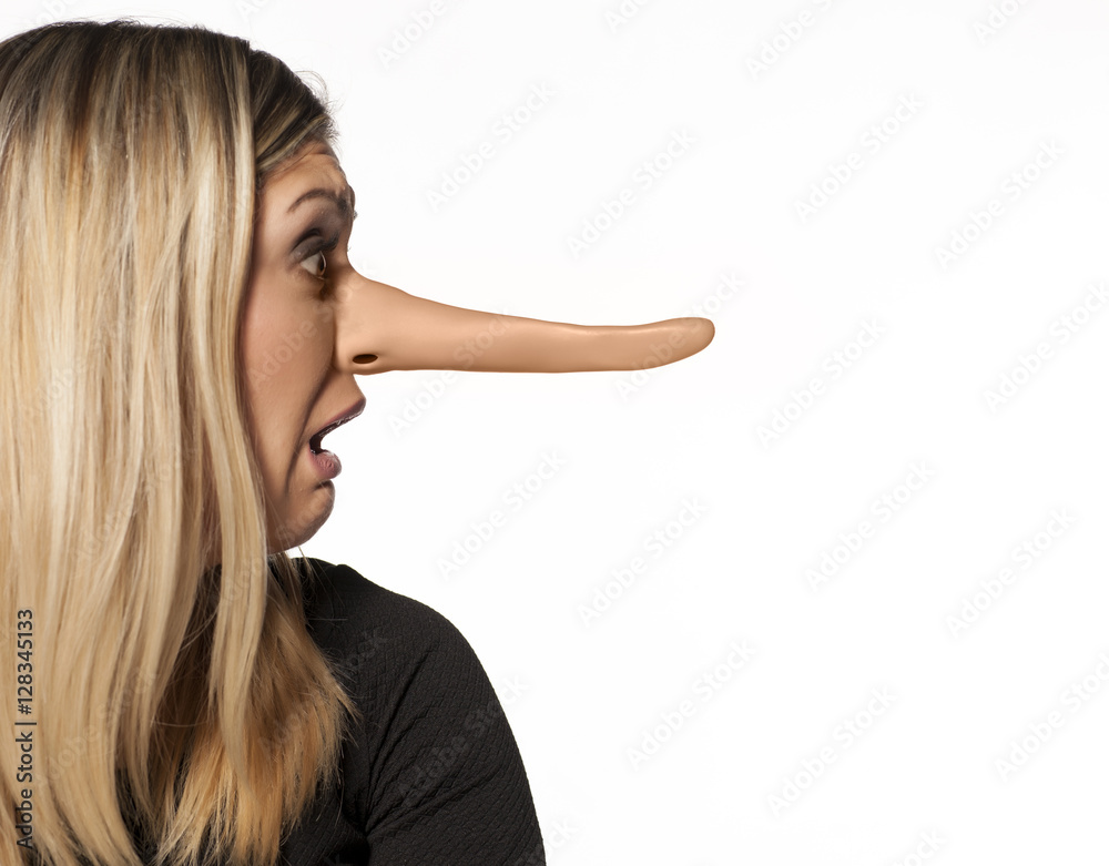 upset young woman with elongated nose. concept of lying Stock Photo ...