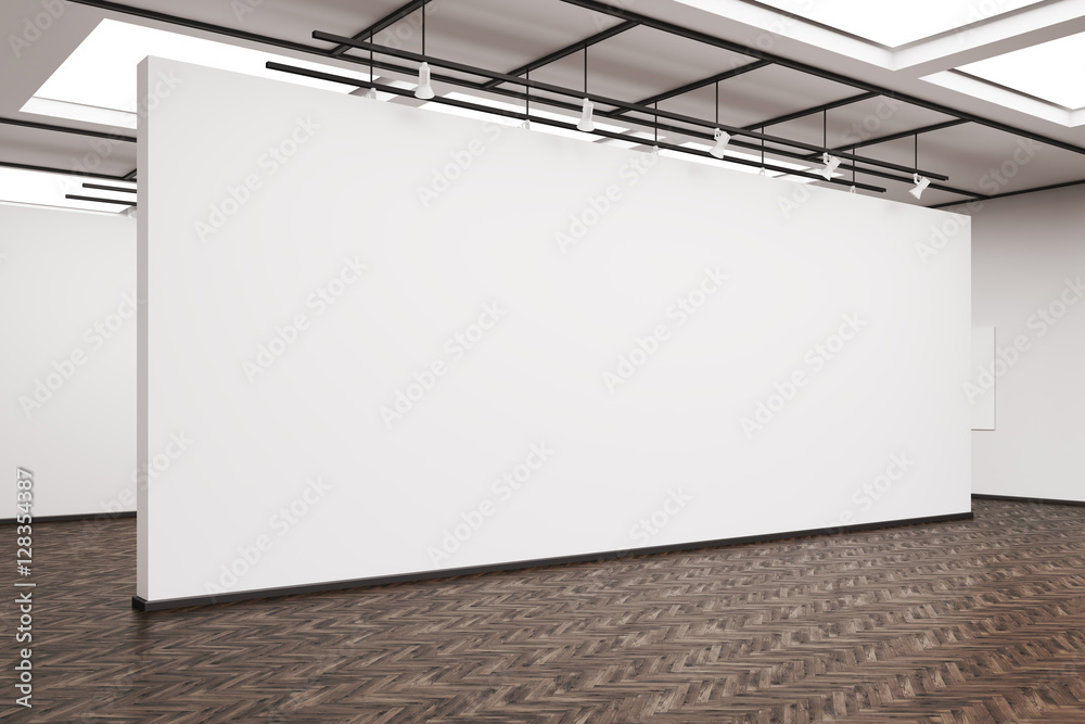 Side view of a large blank wall in an art gallery with dark wood Stock ...