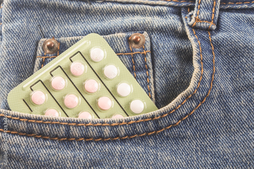 contraceptive pills in denim jean pants woman,lifestyle teenager Stock ...