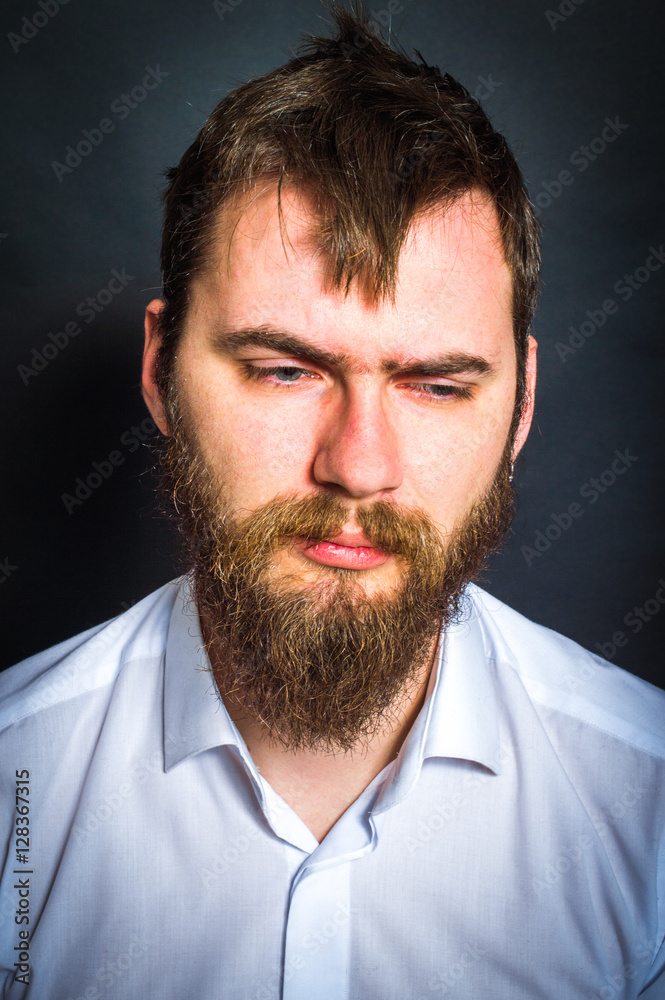 sad man looking down Stock-Foto | Adobe Stock