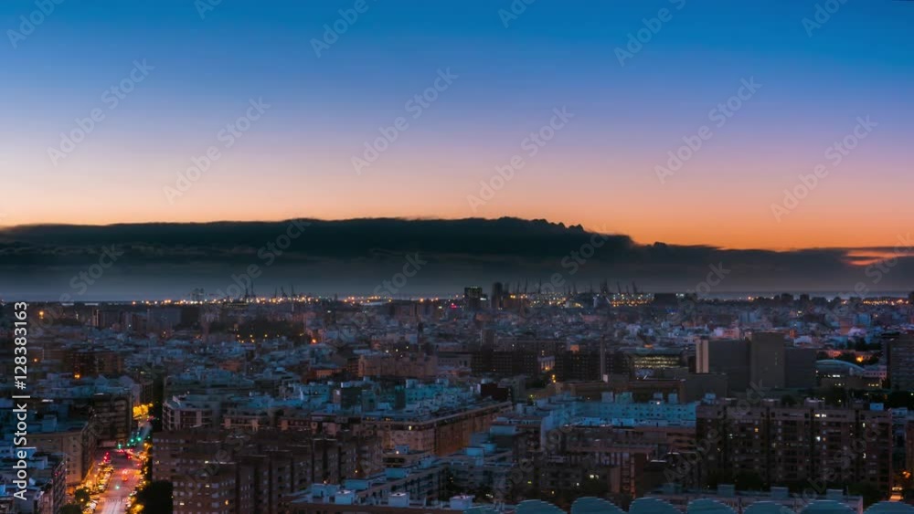 valencia skyline cityscape aerial view timelapse from night to day sun ...