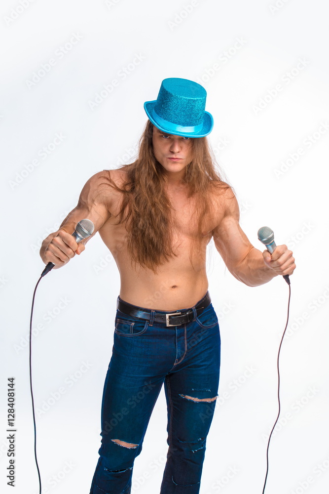 singer bodybuilder shirtless with long hair in a blue hat with a ...