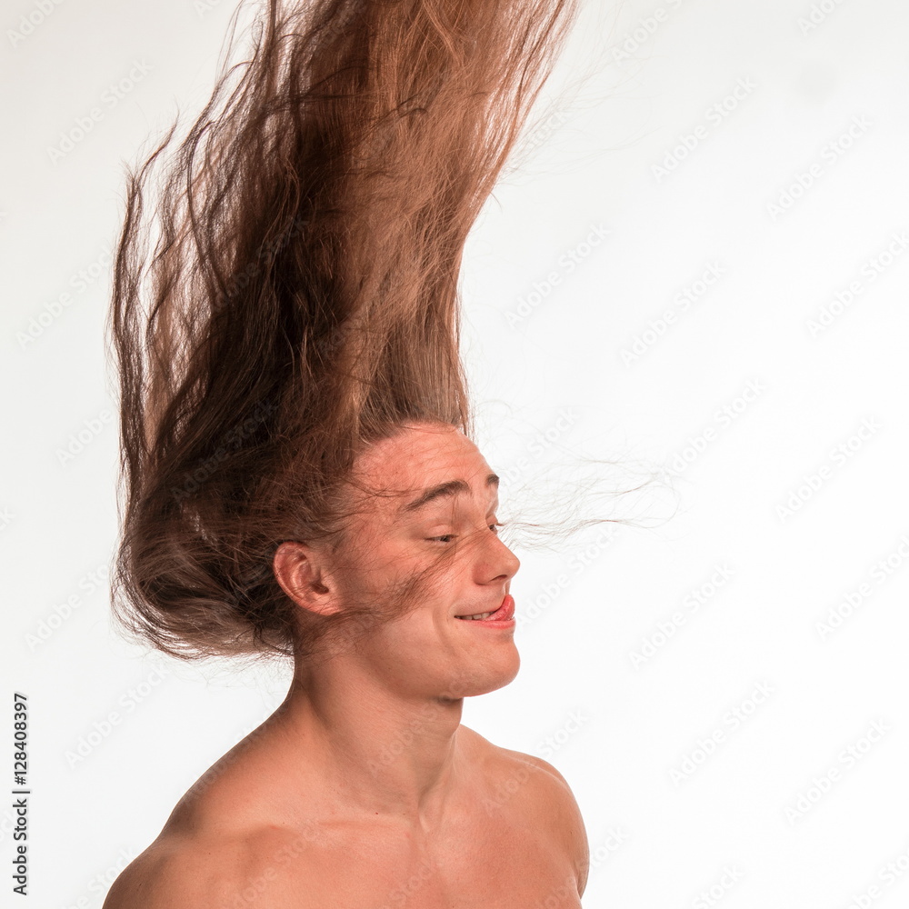 singer bodybuilder shirtless with long hair with a microphone on a ...