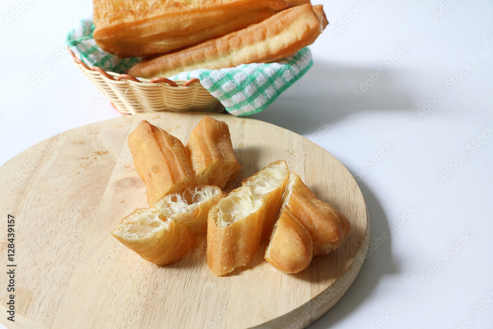 Chinese traditional food, deep fried bread stick normally eaten with ...