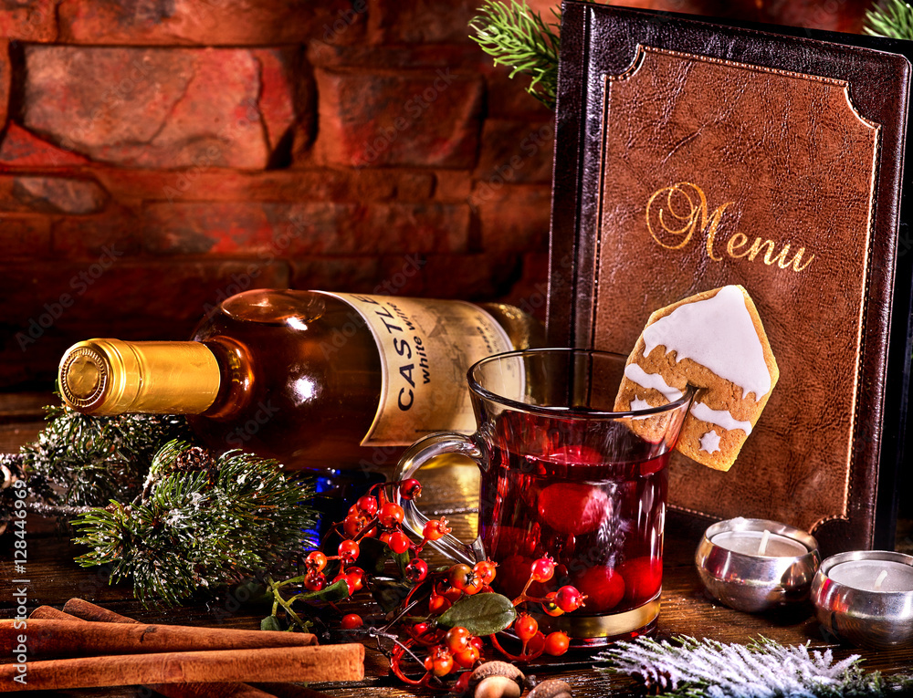 Warming grog with bottle of white wine . Label on bottle of wine ...