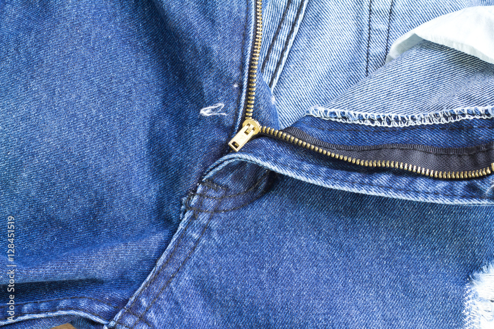 macro of a zip in a jeans Stock Photo | Adobe Stock