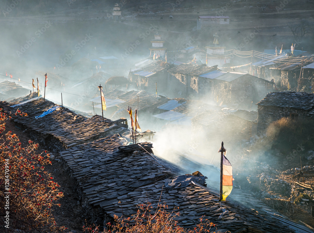 Sunrise view of traditional Nepali village in high hymalaya mountains ...