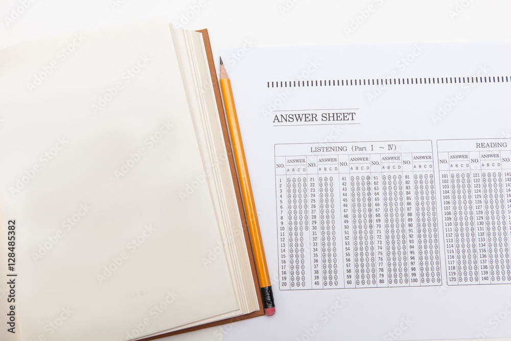 crumpled omr answer sheet and books on white backgrounds Stock-Foto ...