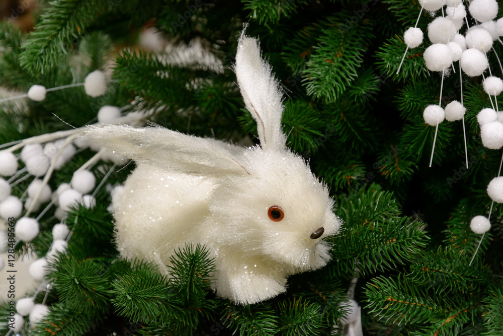 White rabbit. Christmas decorations. Christmas tree. New Year's Stock ...
