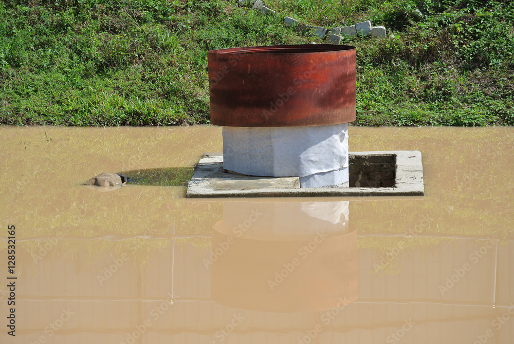 Sediment pond, where soil and mud from the construction site in ...