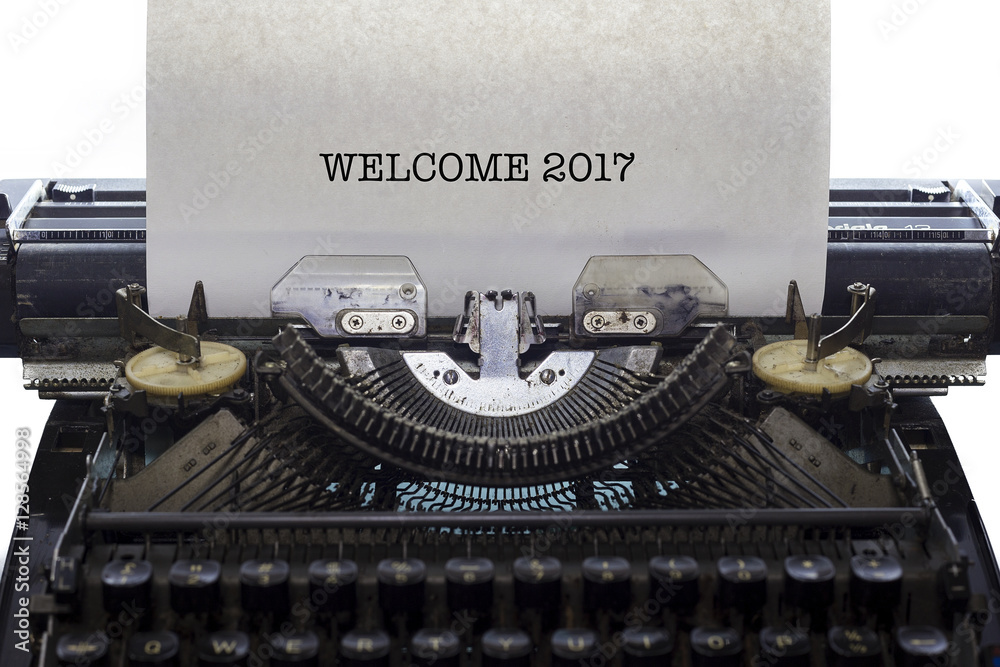 Vintage typewriter on white background with text WELCOME 2017. Stock ...