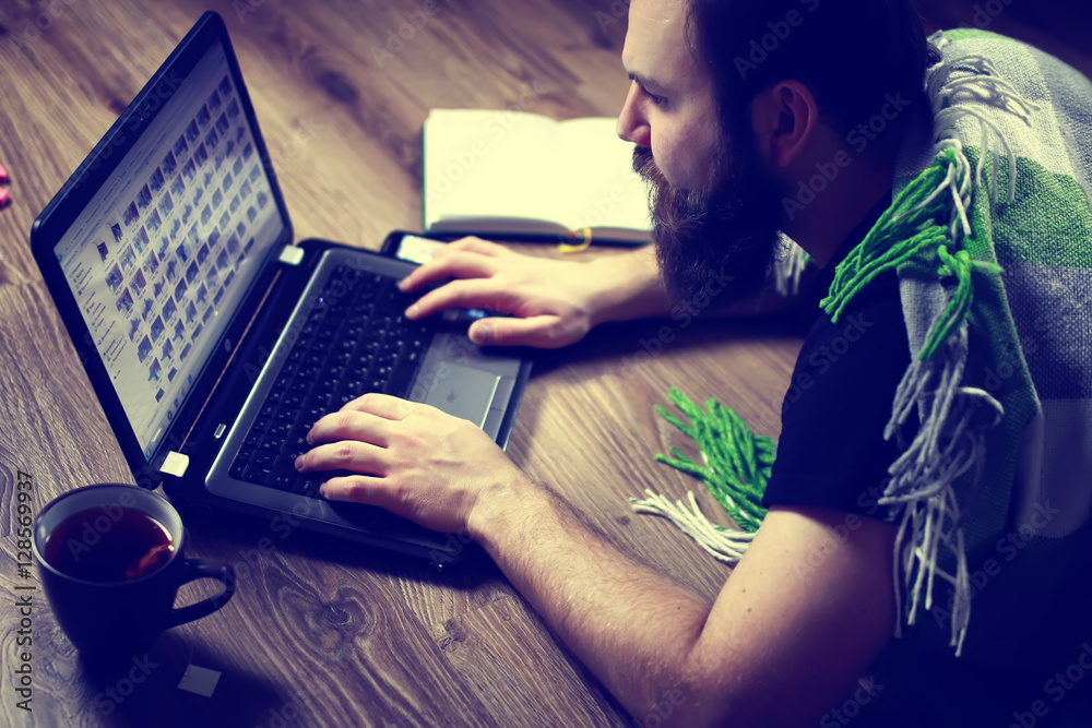 the man on the floor computer Stock Photo | Adobe Stock