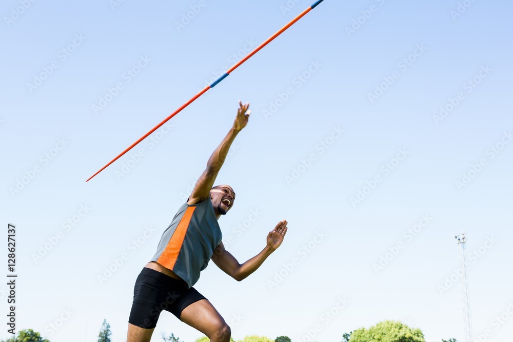 Athlete throwing a javelin Stock Photo | Adobe Stock