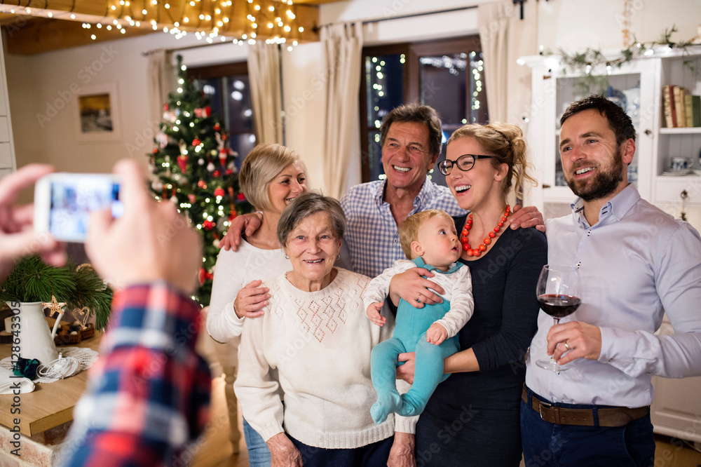 Beautiful big family celebrating Christmat together being photog Stock ...