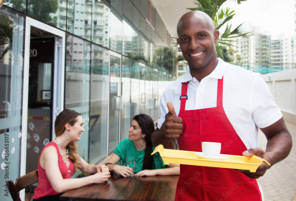Afrikanischer Kellner bei der Arbeit Stock Photo | Adobe Stock