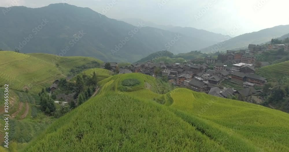 Beautiful 4k aerial shot of Longsheng Village and Terraced Rice Field ...