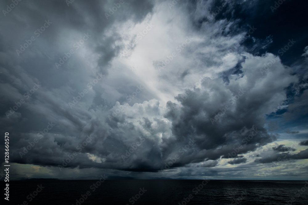 Dark clouds in open ocean Stock Photo | Adobe Stock