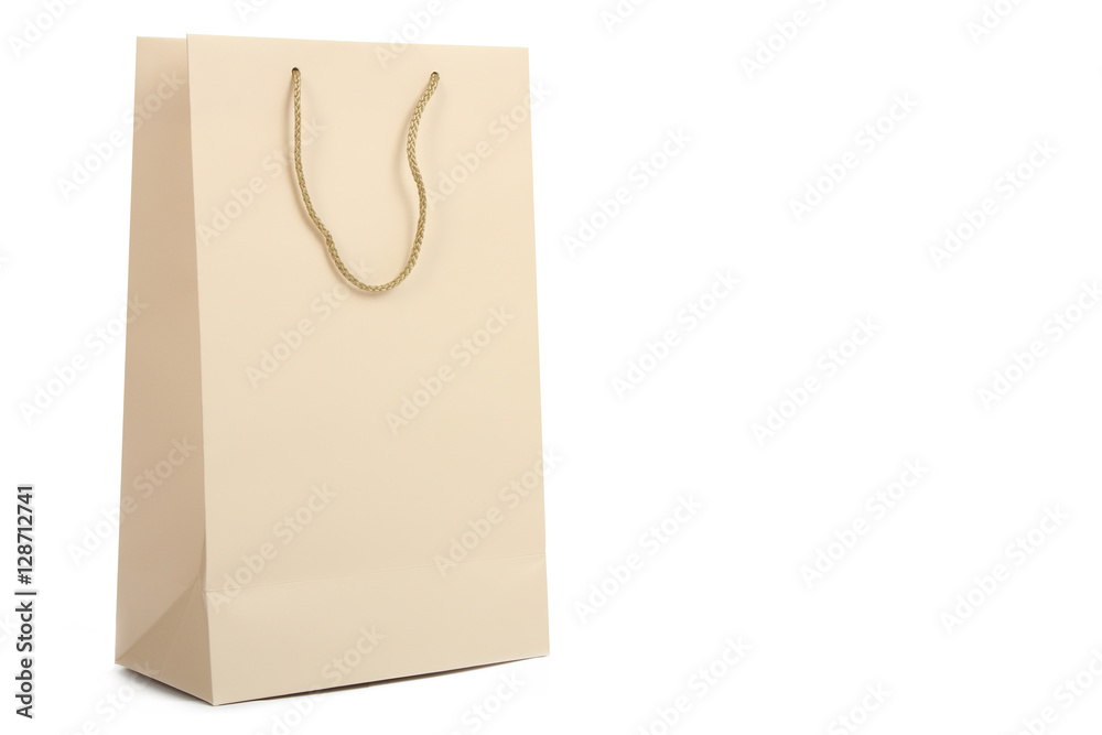Beige shopping bag isolated on white background Stock Photo | Adobe Stock