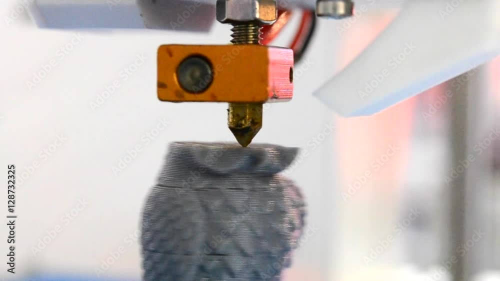 3D printer prints figure close. Automatic three dimensional 3d printer ...