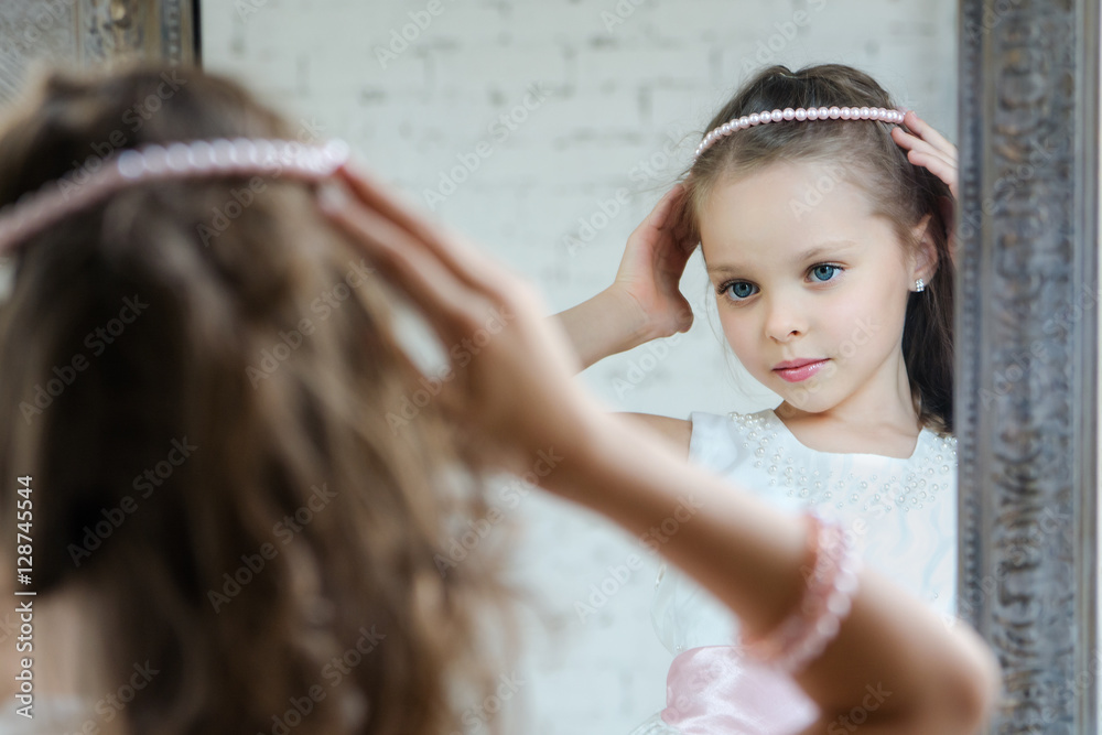 little girl front of the mirror Stock Photo | Adobe Stock