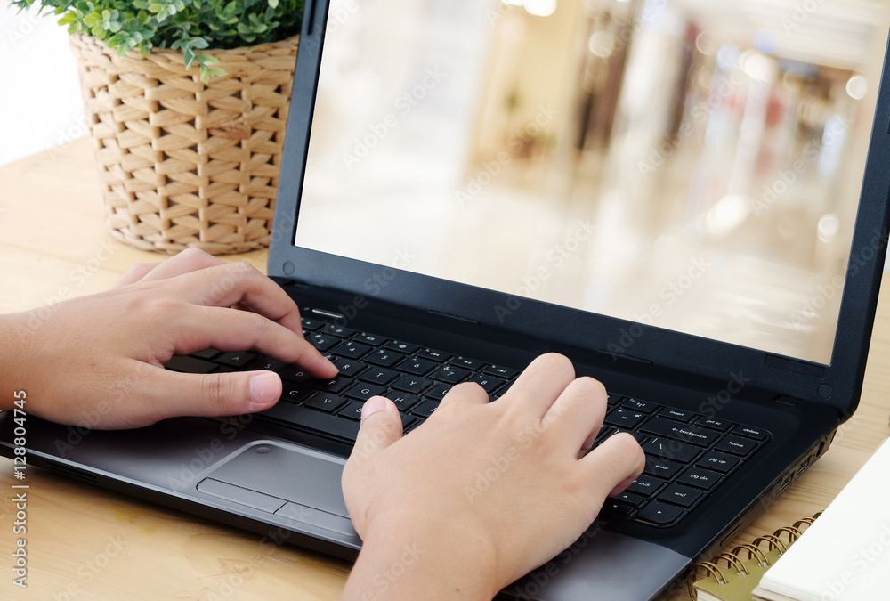 Hand typing laptop with blank blur background on screen Stock Photo ...