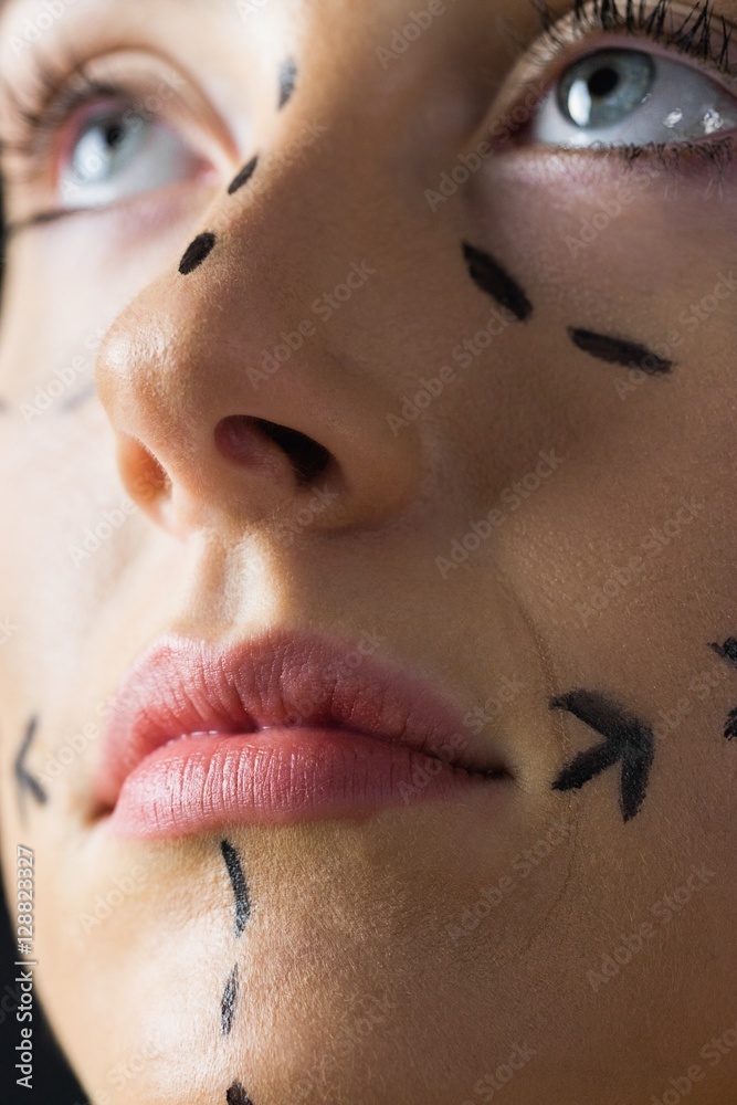 Peaceful young patient with dotted lines on the face Stock Photo ...