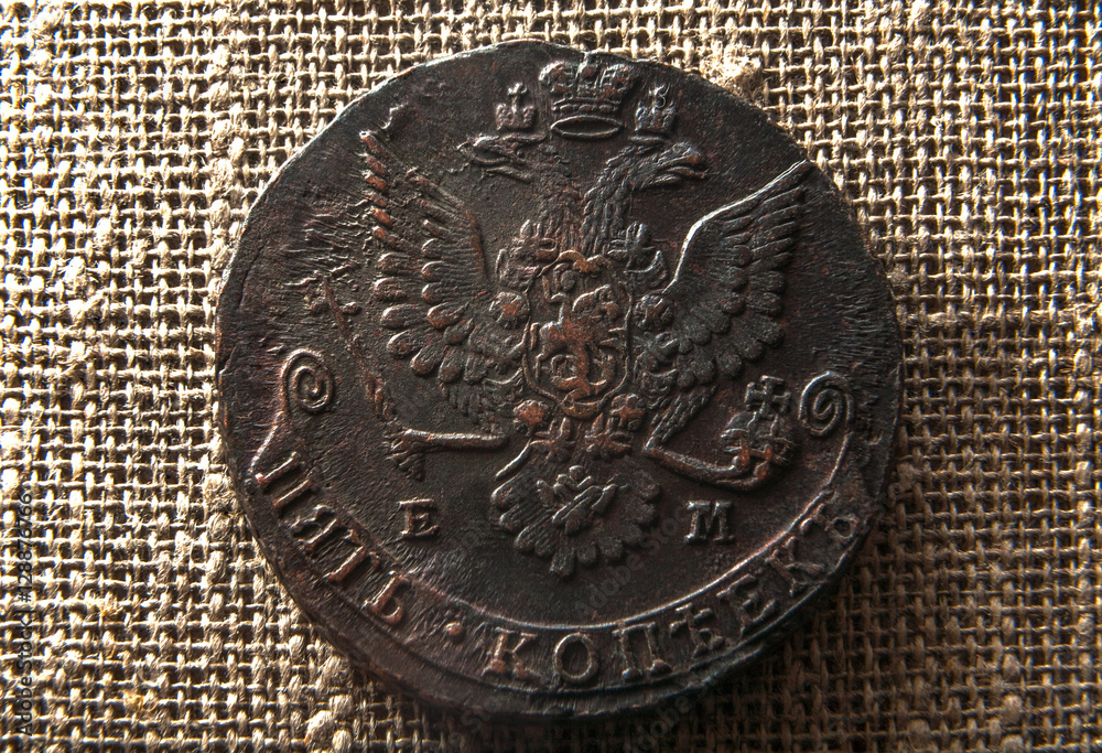 The Russian copper coin with a two-headed eagle and crowns of five ...