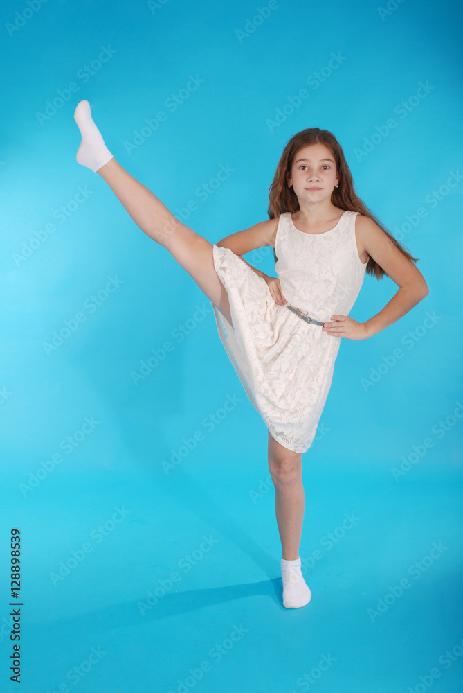 Cheerful Young Girl Pretty Tomboy Raising Her Leg Stock Photo Adobe Stock