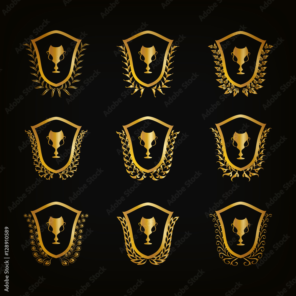Set of luxury golden shields with laurel wreaths, champion cups ...