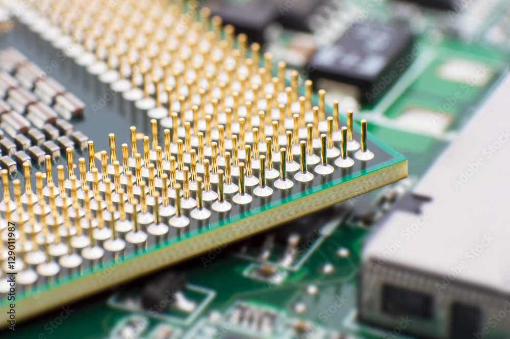 A computer motherboard with half of CPU High technology close u Stock ...