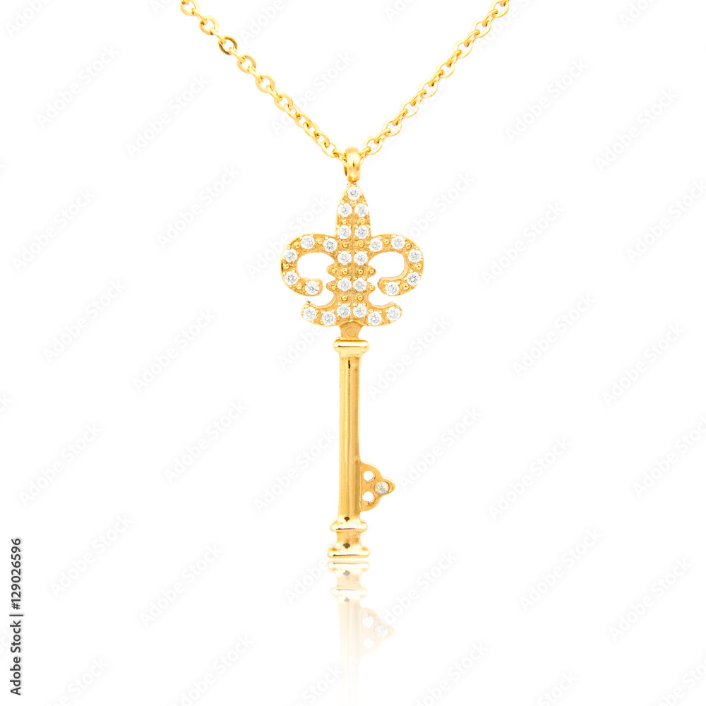 Golden diamond key pendant isolated on white foto de Stock | Adobe Stock