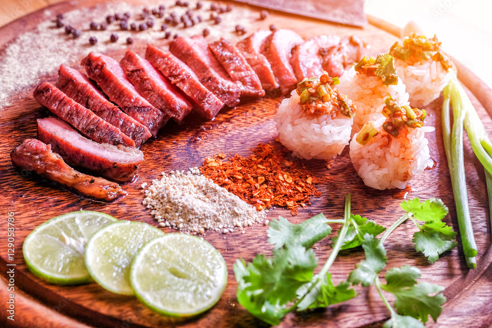 Thai-Style Grilled Steak (Neua Yang) served with sticky rice and chili ...