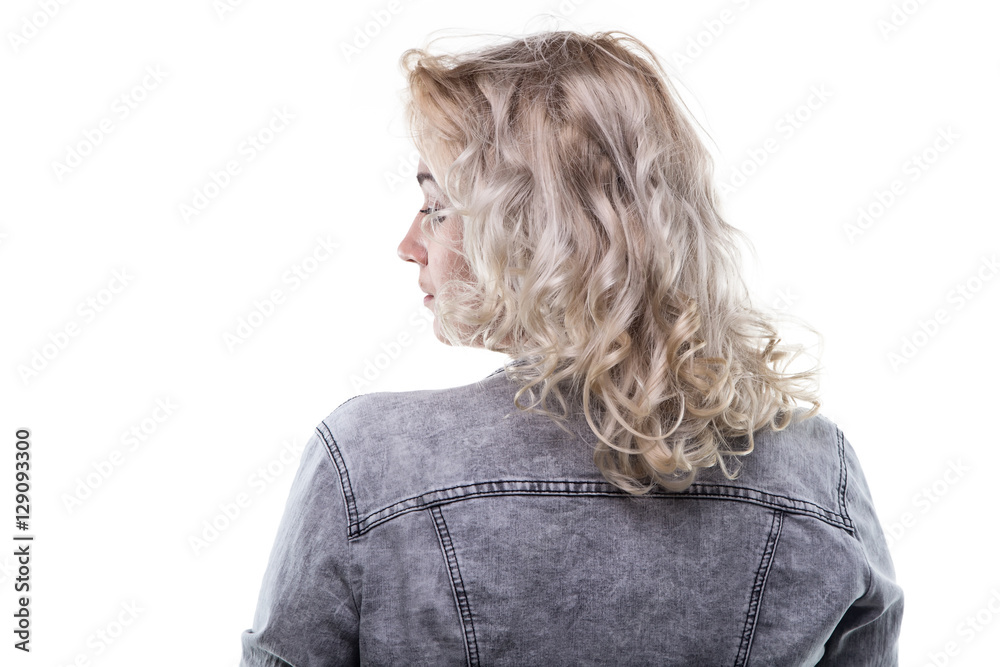 Turned back young blond woman Stock Photo | Adobe Stock