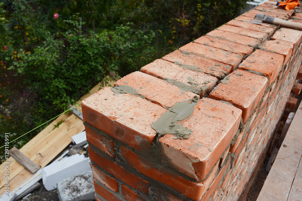 Bricklaying photo. Bricklaying Tips. How to build a brick wall ...