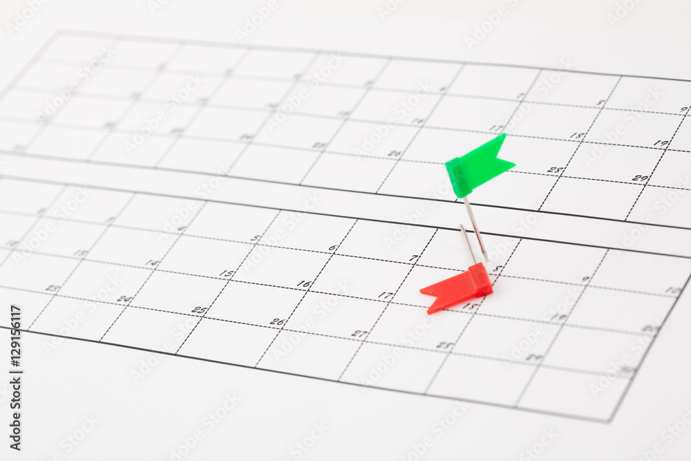Calendar with color pins Stock Photo | Adobe Stock