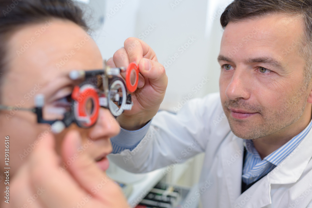 male patient under eye vision examination in correction clinic Stock ...