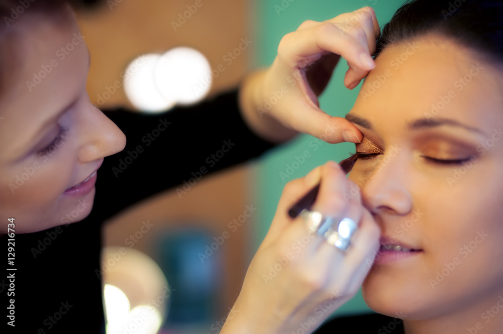 Makeup artist at work Stock Photo | Adobe Stock