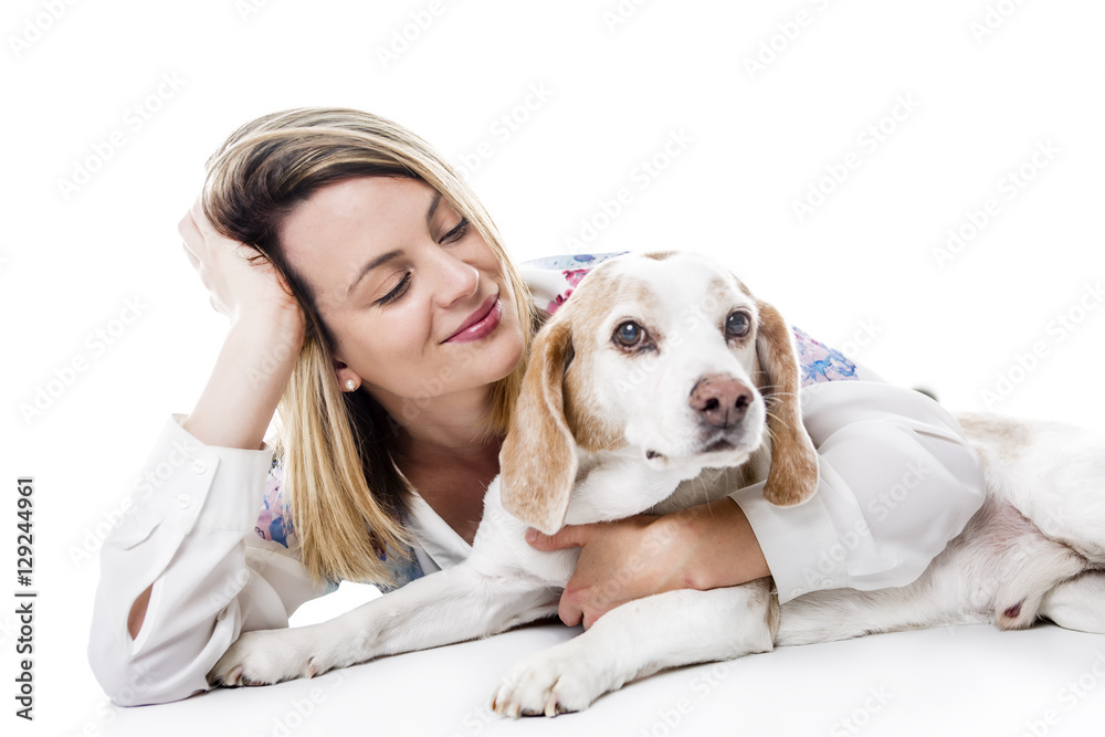 Dog with woman are posing in studio - isolated on white background ...