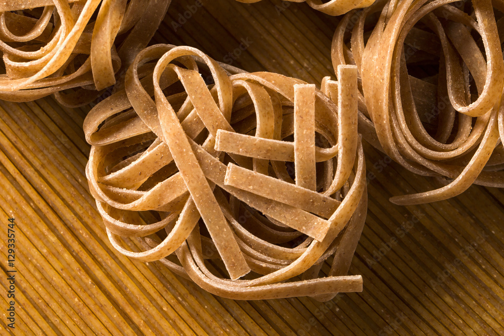 Variety of types and shapes of dry Italian integral pasta Stock Photo ...